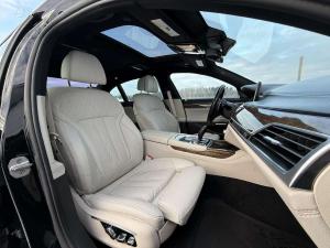 Black BMW 740 2017 in Mazeikiai, with an engine capacity of 3.00 L and mileage of 150 thousand km for 29999 €, photo 18 on AUTOMOTO.COM.LV