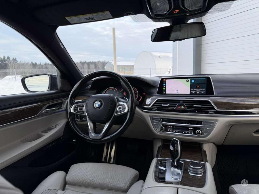 Black BMW 740 2017 in Mazeikiai, with an engine capacity of 3.00 L and mileage of 150 thousand km for 29999 €, photo 24 on AUTOMOTO.COM.LV