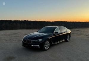 Black BMW 740 2017 in Kaunas, with an engine capacity of 3.00 L and mileage of 112 thousand km for 22999 €, photo  on AUTOMOTO.COM.LV