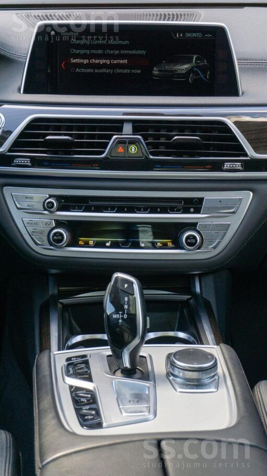 Black BMW 740 2017 in Riga, with an engine capacity of 2.00 L and mileage of 202 thousand km for 20590 €, photo 13 on AUTOMOTO.COM.LV
