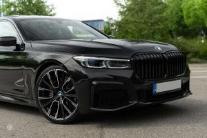 Black BMW 740 2017 in Vilnius, with an engine capacity of 3.00 L and mileage of 137 thousand km for 26000 €, photo 4 on AUTOMOTO.COM.LV