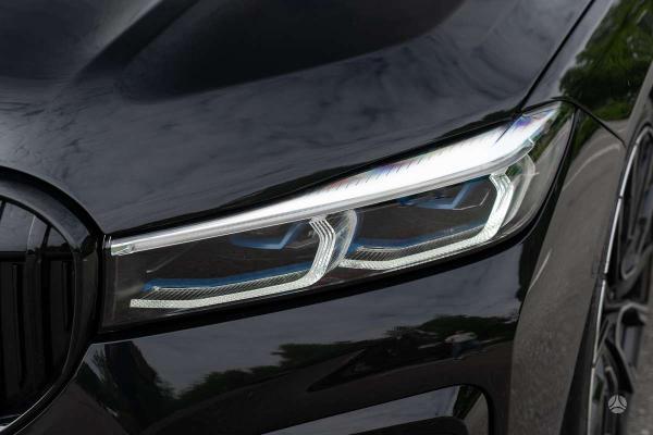 Black BMW 740 2017 in Vilnius, with an engine capacity of 3.00 L and mileage of 137 thousand km for 26000 €, photo 6 on AUTOMOTO.COM.LV