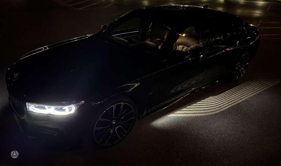 Black BMW 740 2017 in Vilnius, with an engine capacity of 3.00 L and mileage of 137 thousand km for 26000 €, photo 40 on AUTOMOTO.COM.LV