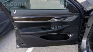 Black BMW 740 2017 in Riga, with an engine capacity of 2.00 L and mileage of 202 thousand km for 21990 €, photo 26 on AUTOMOTO.COM.LV