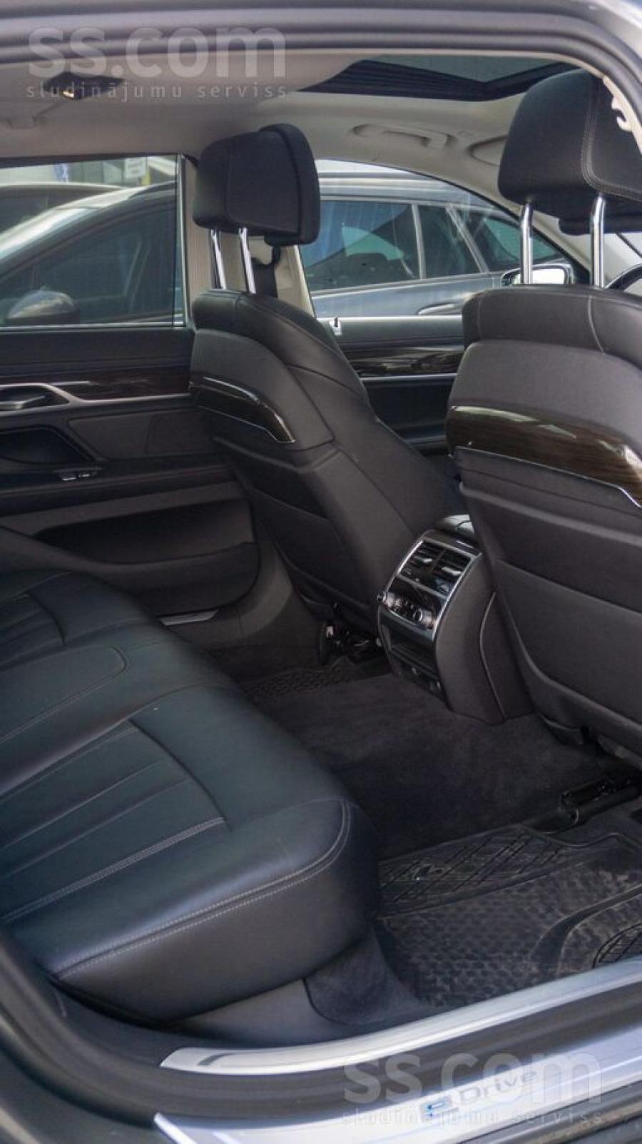 Black BMW 740 2017 in Riga, with an engine capacity of 2.00 L and mileage of 202 thousand km for 21990 €, photo 30 on AUTOMOTO.COM.LV