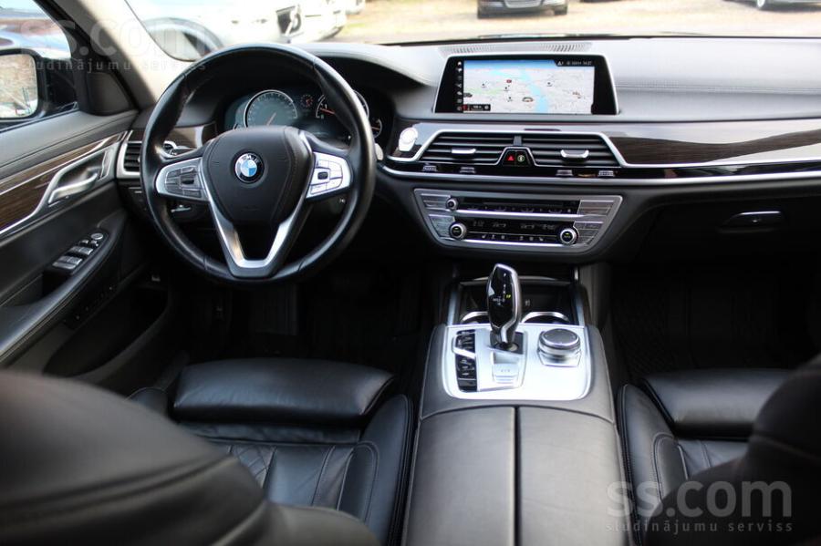 Black BMW 740 2018 in Liepaja, with an engine capacity of 3.00 L and mileage of 118 thousand km for 32500 €, photo 12 on AUTOMOTO.COM.LV
