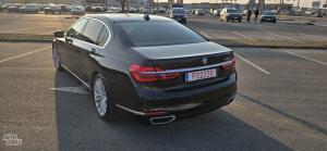 Black BMW 740 2018 in Vilnius, with an engine capacity of 3.00 L and mileage of 168 thousand km for 20950 €, photo 6 on AUTOMOTO.COM.LV