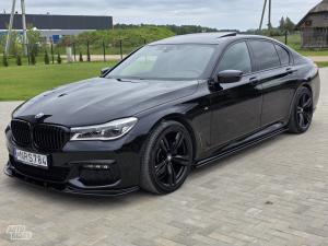 Black BMW 740 2018 in Mazeikiai, with an engine capacity of 3.00 L and mileage of 303 thousand km for 26800 €, photo  on AUTOMOTO.COM.LV
