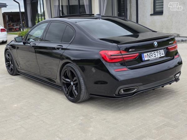 Black BMW 740 2018 in Mazeikiai, with an engine capacity of 3.00 L and mileage of 303 thousand km for 26800 €, photo 2 on AUTOMOTO.COM.LV