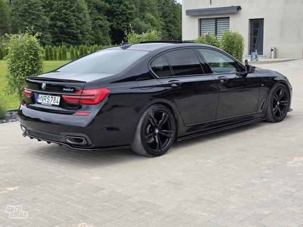 Black BMW 740 2018 in Mazeikiai, with an engine capacity of 3.00 L and mileage of 303 thousand km for 26800 €, photo 4 on AUTOMOTO.COM.LV