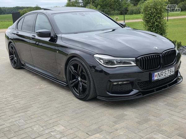Black BMW 740 2018 in Mazeikiai, with an engine capacity of 3.00 L and mileage of 303 thousand km for 26800 €, photo 5 on AUTOMOTO.COM.LV