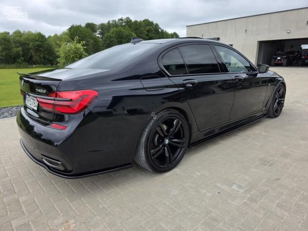 Black BMW 740 2018 in Mazeikiai, with an engine capacity of 3.00 L and mileage of 303 thousand km for 26800 €, photo 9 on AUTOMOTO.COM.LV