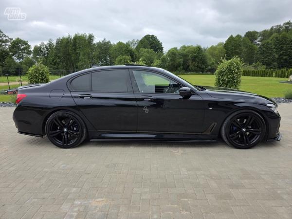 Black BMW 740 2018 in Mazeikiai, with an engine capacity of 3.00 L and mileage of 303 thousand km for 26800 €, photo 10 on AUTOMOTO.COM.LV