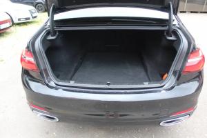 Black BMW 740 2018 in Liepaja, with an engine capacity of 3.00 L and mileage of 120 thousand km for 29500 €, photo 6 on AUTOMOTO.COM.LV