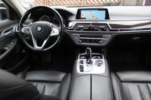 Black BMW 740 2018 in Liepaja, with an engine capacity of 3.00 L and mileage of 120 thousand km for 29500 €, photo 13 on AUTOMOTO.COM.LV