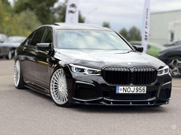Black BMW 740 2018 in Vilnius, with an engine capacity of 3.00 L and mileage of 124 thousand km for 30900 €, photo 1 on AUTOMOTO.COM.LV