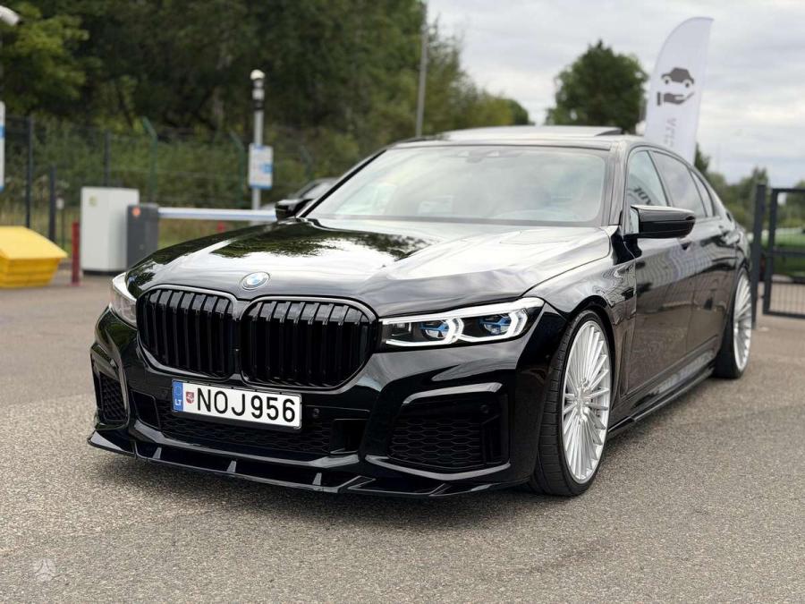 Black BMW 740 2018 in Vilnius, with an engine capacity of 3.00 L and mileage of 124 thousand km for 30900 €, photo 11 on AUTOMOTO.COM.LV