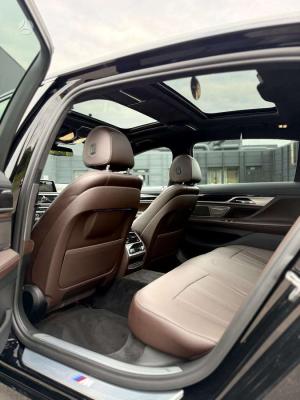 Black BMW 740 2018 in Vilnius, with an engine capacity of 3.00 L and mileage of 124 thousand km for 30900 €, photo 20 on AUTOMOTO.COM.LV