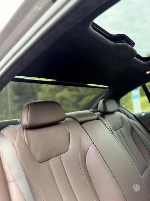 Black BMW 740 2018 in Vilnius, with an engine capacity of 3.00 L and mileage of 124 thousand km for 30900 €, photo 22 on AUTOMOTO.COM.LV