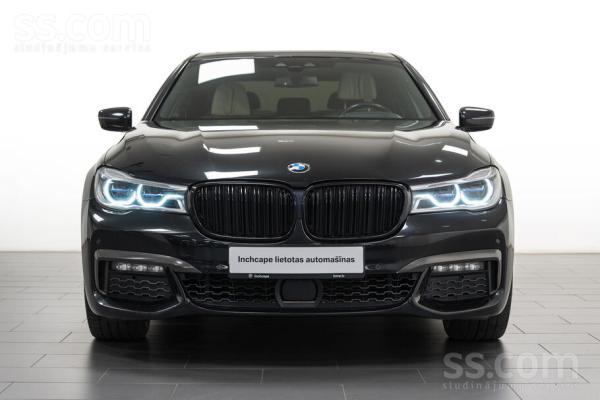 Black BMW 740 2018 in Riga, with an engine capacity of 3.00 L and mileage of 232 thousand km for 28500 €, photo 6 on AUTOMOTO.COM.LV