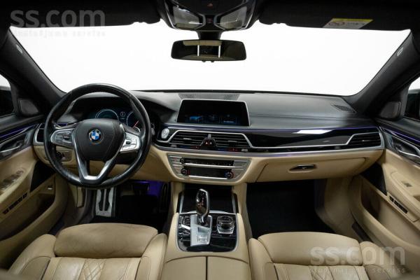 Black BMW 740 2018 in Riga, with an engine capacity of 3.00 L and mileage of 232 thousand km for 28500 €, photo 8 on AUTOMOTO.COM.LV
