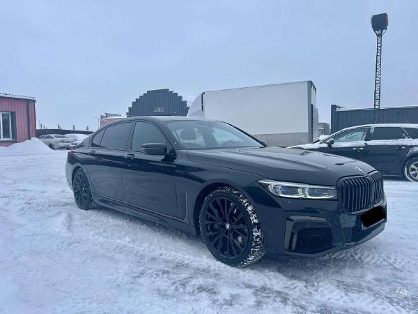 Black BMW 740 2021 in Kaunas, with an engine capacity of 3.00 L and mileage of 60 thousand km for 39999 €, photo 2 on AUTOMOTO.COM.LV
