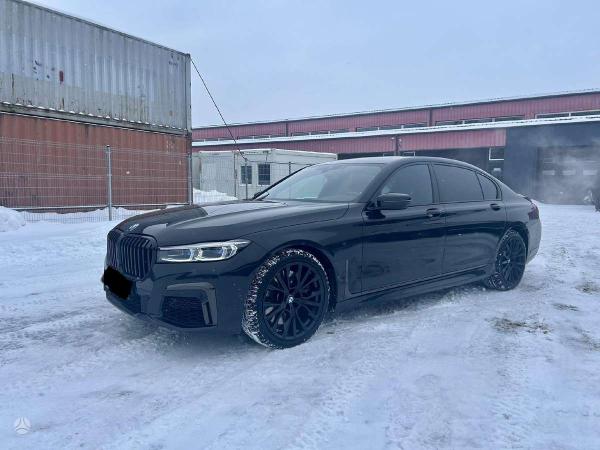 Black BMW 740 2021 in Kaunas, with an engine capacity of 3.00 L and mileage of 60 thousand km for 39999 €, photo 4 on AUTOMOTO.COM.LV