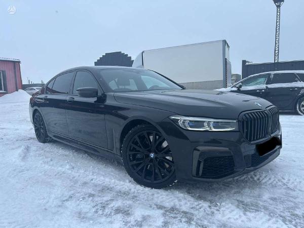 Black BMW 740 2021 in Kaunas, with an engine capacity of 3.00 L and mileage of 60 thousand km for 39999 €, photo 6 on AUTOMOTO.COM.LV