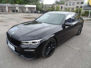 Black BMW 740 2021 in Klaipeda, with an engine capacity of 3.00 L and mileage of 63 thousand km for 39500 €, photo  on AUTOMOTO.COM.LV
