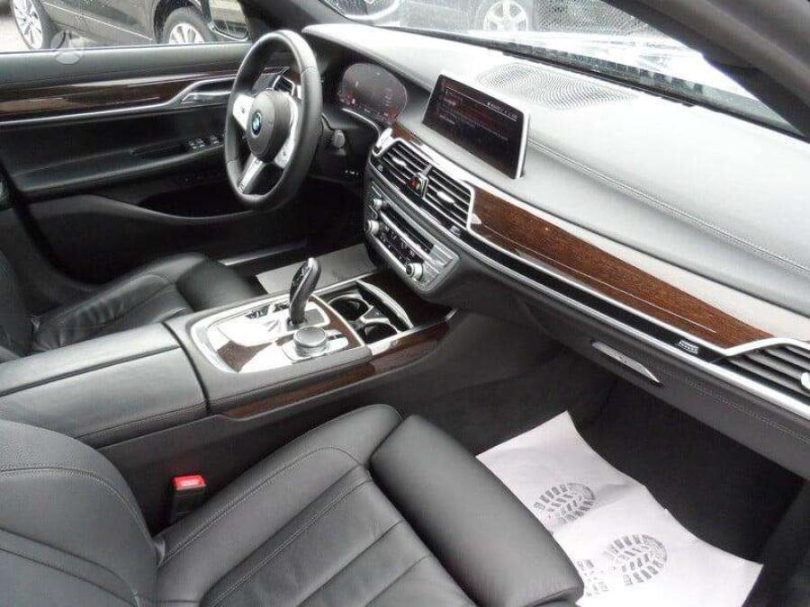 Black BMW 740 2021 in Klaipeda, with an engine capacity of 3.00 L and mileage of 63 thousand km for 39500 €, photo 14 on AUTOMOTO.COM.LV