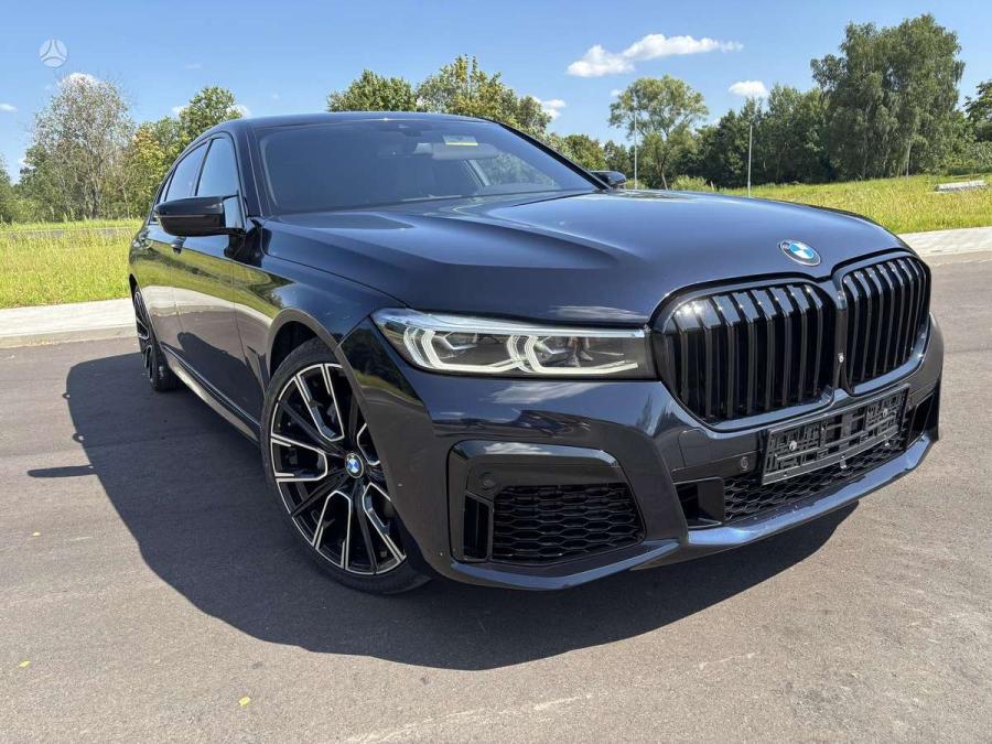 Black BMW 740 2021 in Vilnius, with an engine capacity of 3.00 L and mileage of 100 thousand km for 39500 €, photo 3 on AUTOMOTO.COM.LV