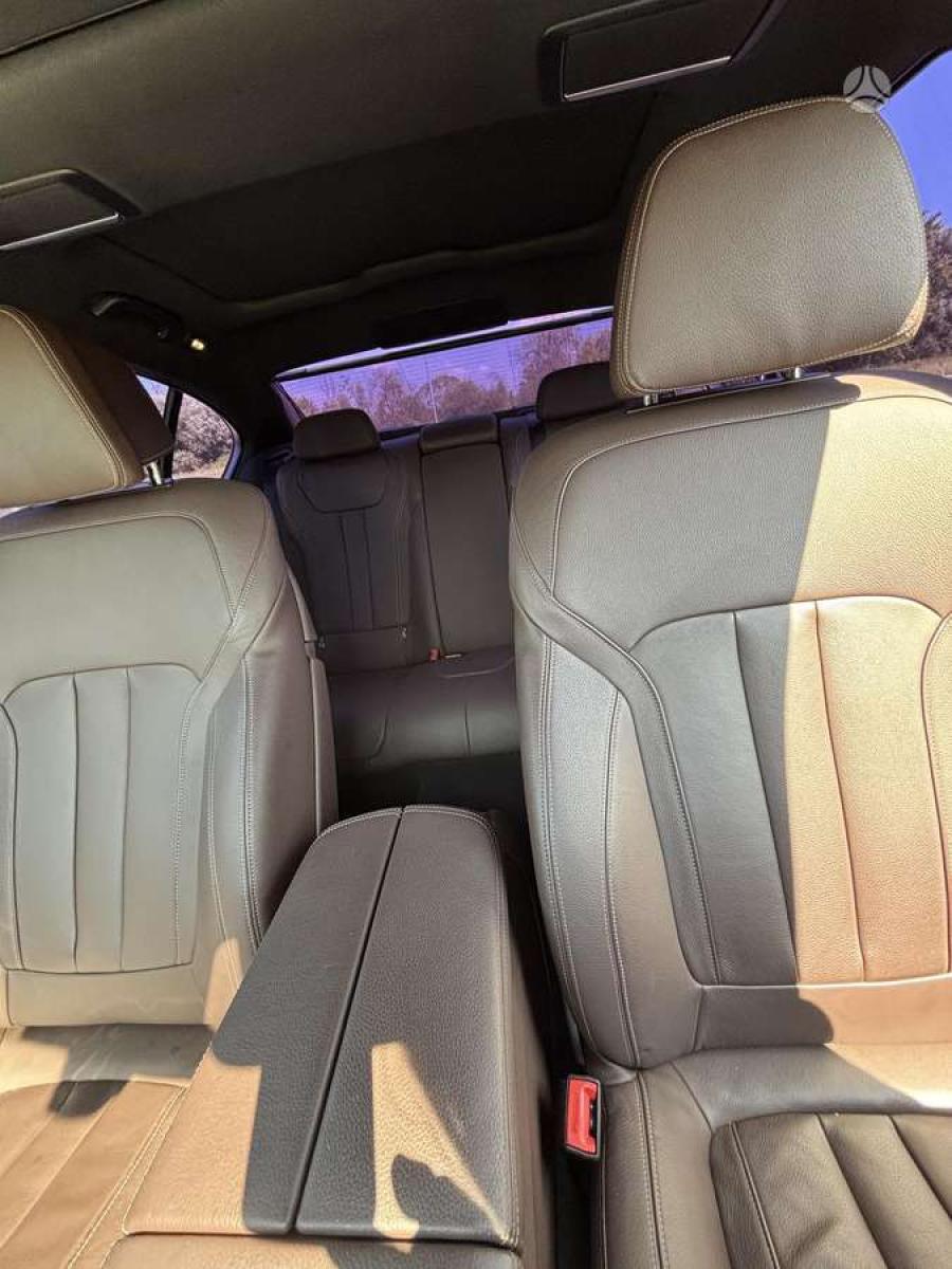 Black BMW 740 2021 in Vilnius, with an engine capacity of 3.00 L and mileage of 100 thousand km for 39500 €, photo 15 on AUTOMOTO.COM.LV
