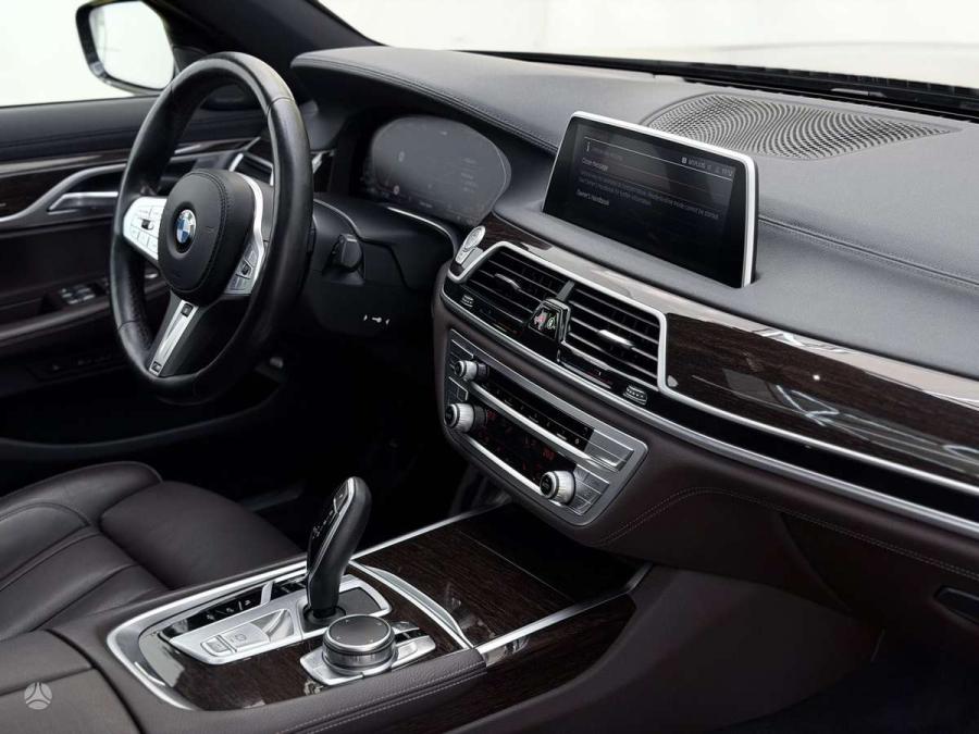 Black BMW 740 2021 in Vilnius, with an engine capacity of 3.00 L and mileage of 100 thousand km for 41000 €, photo 17 on AUTOMOTO.COM.LV
