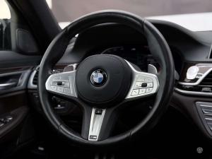 Black BMW 740 2021 in Vilnius, with an engine capacity of 3.00 L and mileage of 100 thousand km for 41000 €, photo 20 on AUTOMOTO.COM.LV
