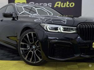 Black BMW 740 2021 in Vilnius, with an engine capacity of 3.00 L and mileage of 100 thousand km for 41000 €, photo 39 on AUTOMOTO.COM.LV