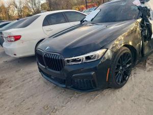 Black BMW 740 2022 in Vilnius, with an engine capacity of 3.00 L and mileage of 105 thousand km for 19400 €, photo  on AUTOMOTO.COM.LV