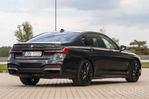 Black BMW 740 2022 in Jurmala, with an engine capacity of 3.00 L and mileage of 112 thousand km for 65000 €, photo 3 on AUTOMOTO.COM.LV