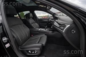 Black BMW 740 2022 in Jurmala, with an engine capacity of 3.00 L and mileage of 112 thousand km for 65000 €, photo 26 on AUTOMOTO.COM.LV