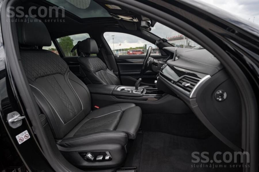 Black BMW 740 2022 in Jurmala, with an engine capacity of 3.00 L and mileage of 112 thousand km for 65000 €, photo 26 on AUTOMOTO.COM.LV