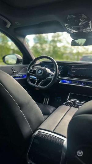 Black BMW 740 2023 in Vilnius, with an engine capacity of 2.99 L and mileage of 60 thousand km for 79800 €, photo 14 on AUTOMOTO.COM.LV