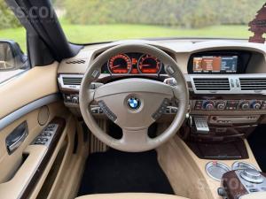 Blue BMW 740 2006 in Riga, with an engine capacity of 4.00 L and mileage of 0 thousand km for 5490 €, photo 21 on AUTOMOTO.COM.LV