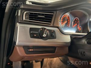 Blue BMW 740 2011 in Riga, with an engine capacity of 3.00 L and mileage of 349 thousand km for 13500 €, photo 11 on AUTOMOTO.COM.LV