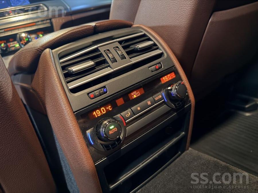 Blue BMW 740 2011 in Riga, with an engine capacity of 3.00 L and mileage of 349 thousand km for 13500 €, photo 18 on AUTOMOTO.COM.LV