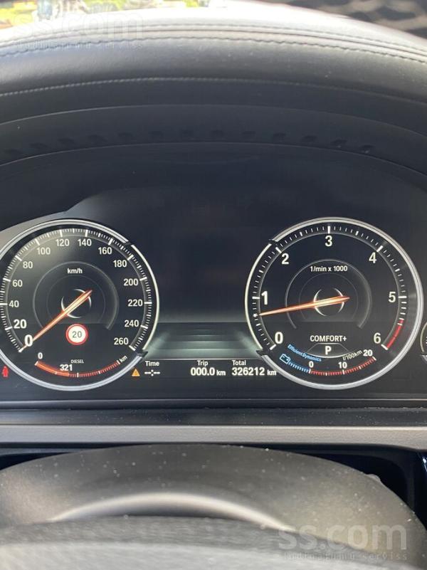 Blue BMW 740 2011 in Ogre, with an engine capacity of 3.00 L and mileage of 327 thousand km for 10600 €, photo 5 on AUTOMOTO.COM.LV