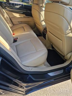 Blue BMW 740 2012 in Jelgava, with an engine capacity of 3.00 L and mileage of 293 thousand km for 9980 €, photo 10 on AUTOMOTO.COM.LV
