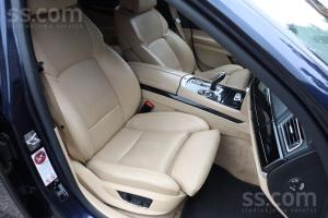 Blue BMW 740 2012 in Valmiera, with an engine capacity of 3.00 L and mileage of 293 thousand km for 9990 €, photo 7 on AUTOMOTO.COM.LV