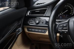 Blue BMW 740 2012 in Valmiera, with an engine capacity of 3.00 L and mileage of 293 thousand km for 9990 €, photo 18 on AUTOMOTO.COM.LV