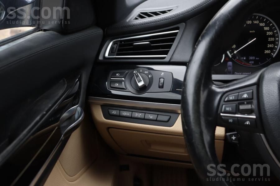 Blue BMW 740 2012 in Valmiera, with an engine capacity of 3.00 L and mileage of 293 thousand km for 9990 €, photo 18 on AUTOMOTO.COM.LV