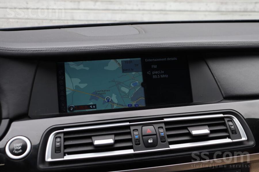 Blue BMW 740 2012 in Valmiera, with an engine capacity of 3.00 L and mileage of 293 thousand km for 9990 €, photo 23 on AUTOMOTO.COM.LV