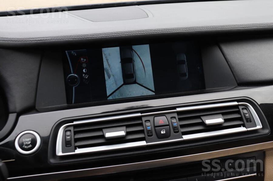 Blue BMW 740 2012 in Valmiera, with an engine capacity of 3.00 L and mileage of 293 thousand km for 9990 €, photo 26 on AUTOMOTO.COM.LV
